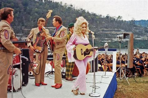 Dolly Partons Most Iconic Fashion Moments From Rhinestones To Denim
