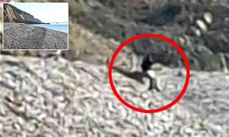 Moment Dopey Walkers Sit Beneath Tottering Cliff Hours After Thousands
