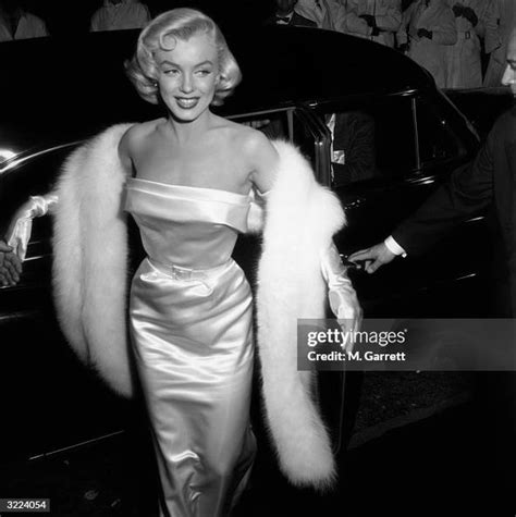 Marilyn Monroe Arriving At The Premiere Of The Film Theres No News