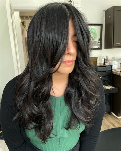 Layered Haircuts 2026 Long Medium And Short Cuts With Curtain Bangs