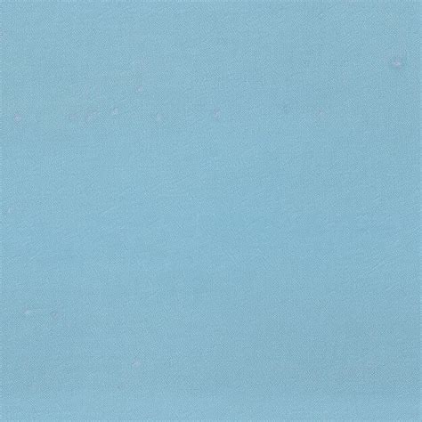 Premium Ai Image There Is A Blue Fabric With A Small White Dot On It