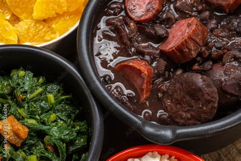 Feijoada Typical And Traditional Food Of Brazilian Cuisine Served