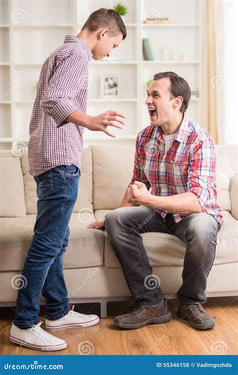 Father And Son At Home Stock Photo Image Of Rebellious