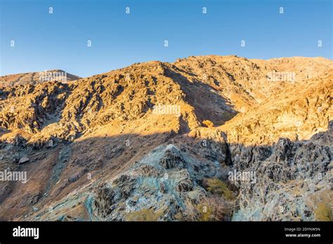 Barren Mountain In Darband Valley In Autumn In The Morning Against Blue