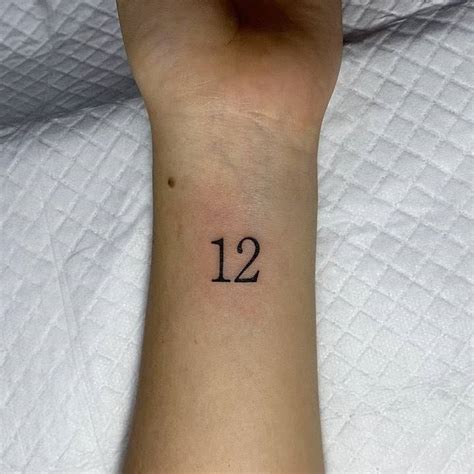 Number 12 Tattooed On The Wrist