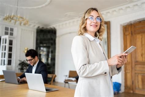 Premium Photo A Female Creative Manager And A Male Colleague Are