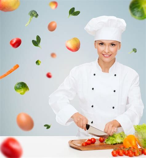 Conceito De Culinária E Comida Chef Feminino Sorridente Cozinheiro