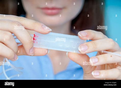 Researcher With Lab On A Chip Stock Photo Alamy