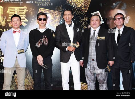 From Left Hong Kong Actor Chapman To Nicholas Tse Chow Yun Fat Director Wong Jing Pose At A