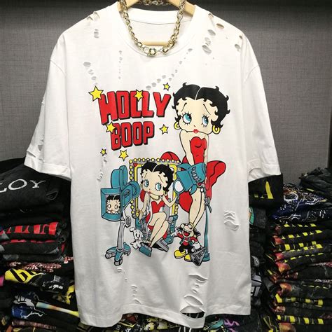 เสื้อขาด เสื้อโอเวอร์ไซส์ ลายการ์ตูน ลายน่ารัก อก44 46 ยาว28 ผ้าคอตตอน ผ้าฟอก แต่งขาดแฟชั่น