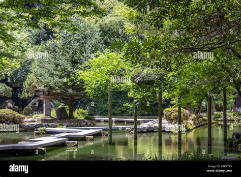 Pond With Wooden Walkways Oyama Jinja Shinto Shrine In Summer