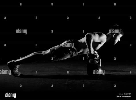 Fitness Training Man Doing Push Ups Exercise Using Dumbbells Or