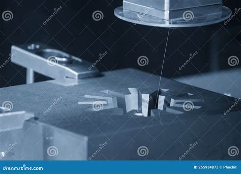 Closeup Scene The Wire Edm Machine Cutting The Mold Insert Parts Stock