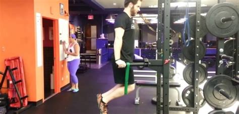 Band Assisted Triceps Dips • Bodybuilding Wizard