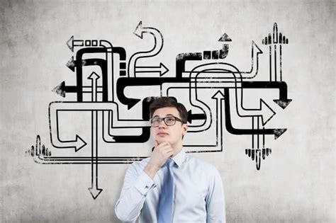 Premium Photo Young Man And Arrow Pipeline On Concrete Wall