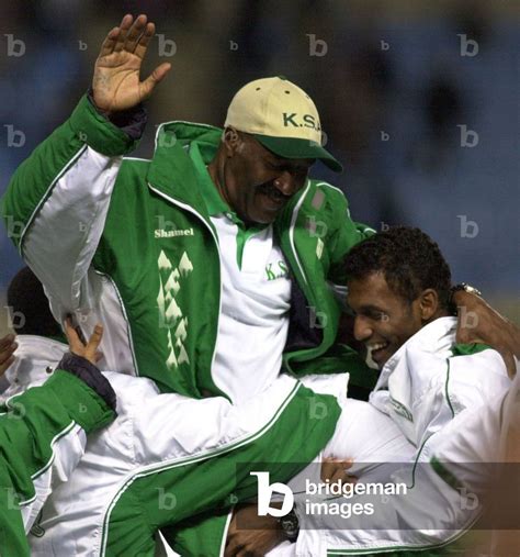 Image Of Saudi Arabias Coach Nasar Al Johar Celebrates Victory Over