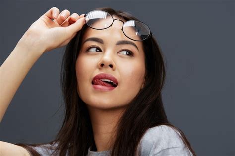 Premium Photo Brunette In Round Glasses Smile Posing Closeups