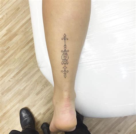 Sak Yant Thai Tattoo Symbol On A Girls Leg Cute Foot Tattoos Up