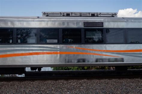 Premium Photo Domestic Train Pass The Rail Way When Day Time With Blue Sky