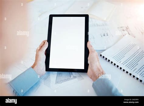 Architecture Tablet Mockup In Hands Of Architect Business And Blueprint Plan With Construction