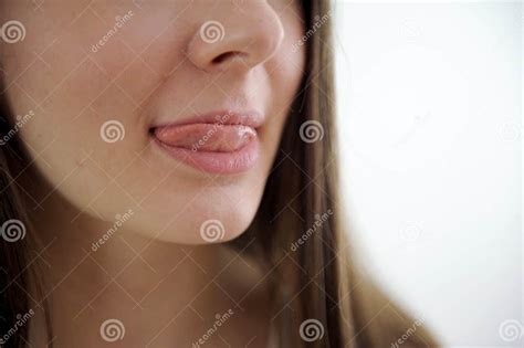 Lick Lips Close Up Mouth And Tongue Young Beautiful Girl On A White