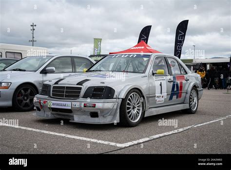 Mercedes AMG W202 DTM on the race track Stock Photo - Alamy
