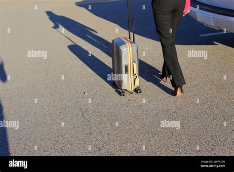 Close Up Of Female Legs Of Businesswoman Wearing High Heels And