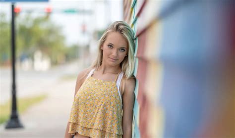 Download Senior Blonde Girl On Wall Pictures