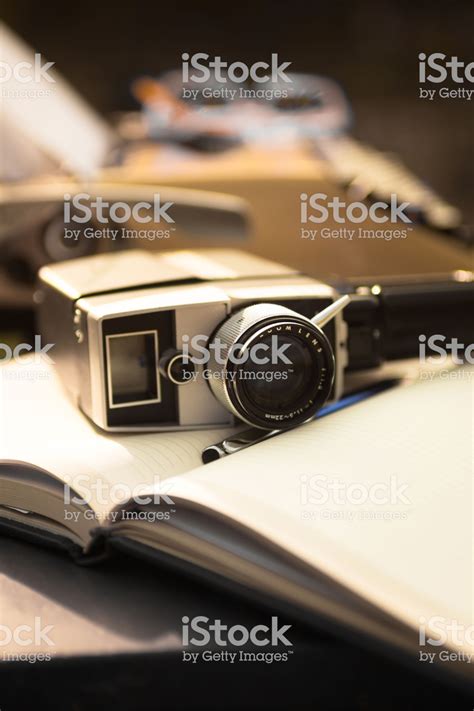 Old Analog Camera Organiser And Typewriter On A Table In The