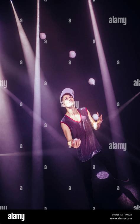 Male Performer Juggling Balls On Stage Stock Photo Alamy