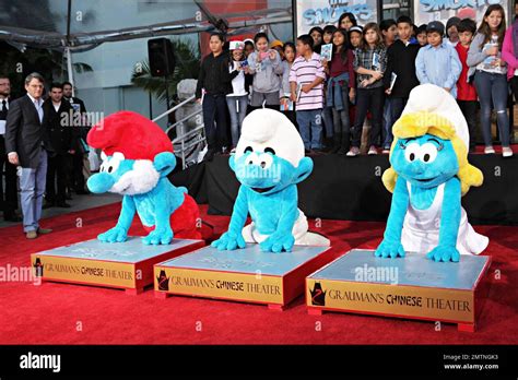 Papa Smurf Clumsy And Smurfette At The Smurfs Handprint And Footprint