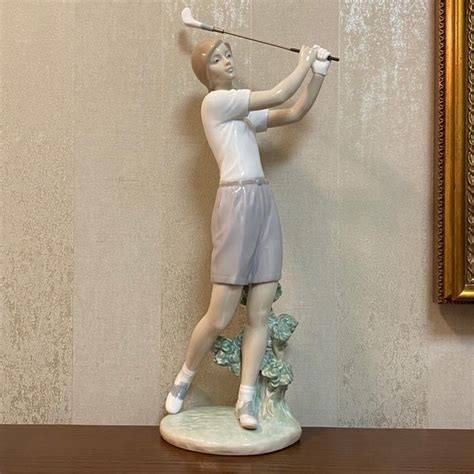 Порцелянова статуетка Lladro «чемпіонка з гольфом — ціна 8200 грн у каталозі Статуетки Купити