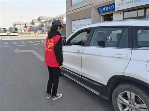 志愿服务长春光华学院商学院青年志愿者参加长春市首届净月潭半程马拉松志愿活动 长春光华学院商学院