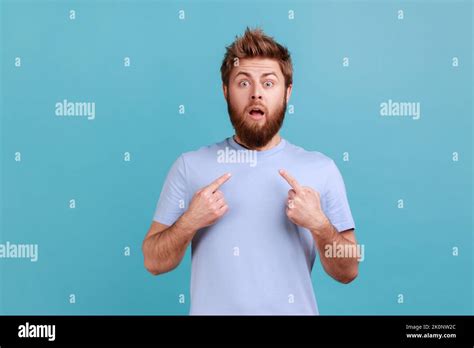 Wow This Is Me Portrait Of Astonished Bearded Man Staring In