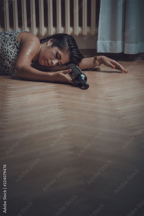 Bruised Beaten Woman Alcoholic Lying Down On The Ground Sleeping And