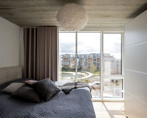 Bigによる、デンマーク・オーフスの集合住宅「sneglehusene」。開発された新地区に計画。モジュラーハウジングのコンセプトで構想され、コミュニティの中心となる池の周囲に6棟の建物が