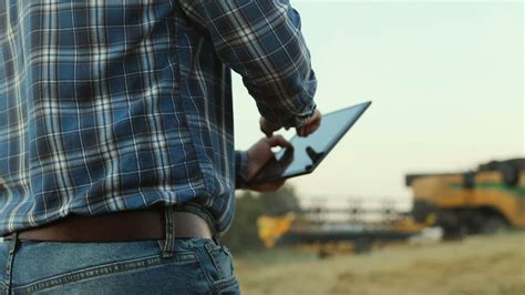 Free Stock Video Close Up Of Man Holding A Tablet In Their Hands
