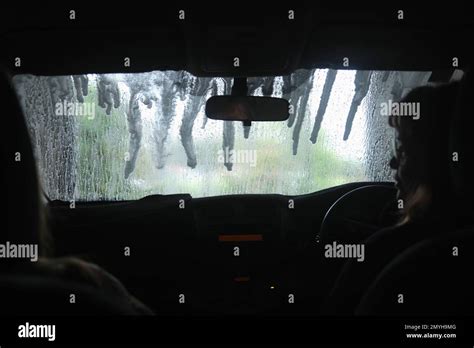 View From Inside A Car As It Goes Through An Automatic Car Wash Wet