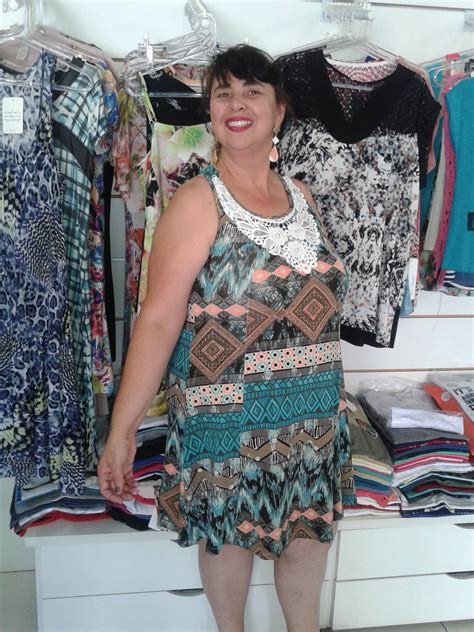 fg confecções ltda cliente satisfeita em vestir os looks da zy 9