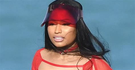 Nicki Minaj Flaunts Unreal Curves In Red Cutout Swimsuit As She Films Music Video With Rapper