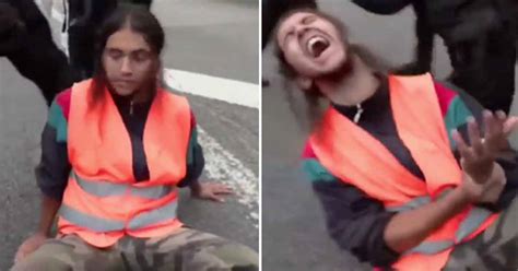Climate Protestor With Hand Glued To The Pavement Is Swiftly Dealt With