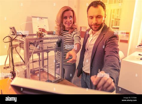 Smart Successful Ceo And Her Loyal Assistant Checking The Accuracy Of Smart Successful Ceo And Her Loyal Assistant Checking The Accuracy Of