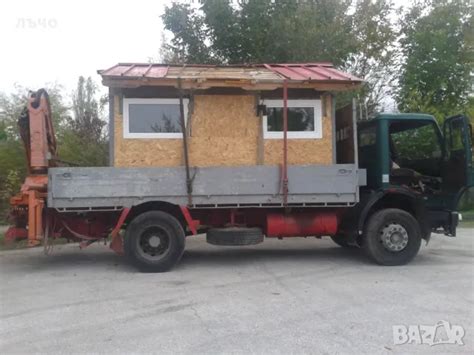 Транспортни услуги Плевен Камион с кран Самосвал Открити и закрити платформи в Транспортни