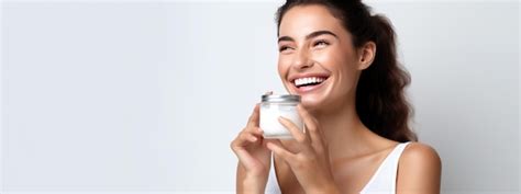 Premium Photo Jound Woman Holds Jar With Cosmetic Cream Attractive Woman With Perfect Skin On