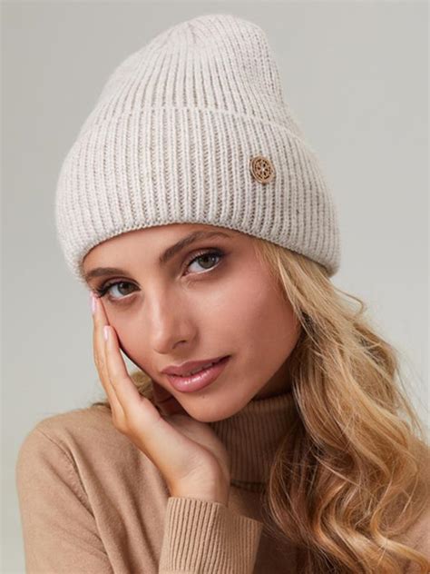 Жіноча тепла світло бежева шапка — ціна 280 грн у каталозі Шапки Купити аксесуари за доступною