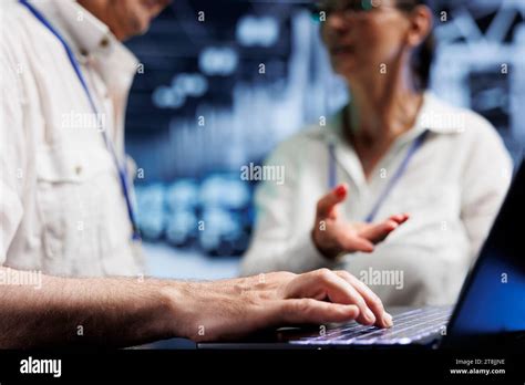 Cloud Computing Business Executives Discussing How To Prevent Blade Servers Strains Caused By Ai