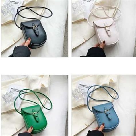 Happyelephant 여자 세로 벨트 미니 크로스백 핫트랙스