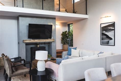 Modern Living Room With Cozy Furniture Large Tv And Stylish Decor Copy Space Stock Image