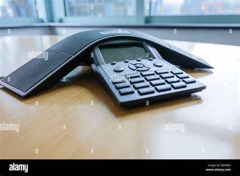 A Cisco Polycom Ip Spider Conference Phone In A Modern Office Stock