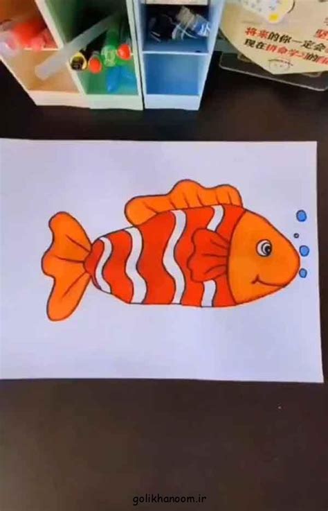 نقاشی ماهی کودکانه ” 2025؛ همراه با رنگ آمیزی بسیار زیبا با تنوع گلی